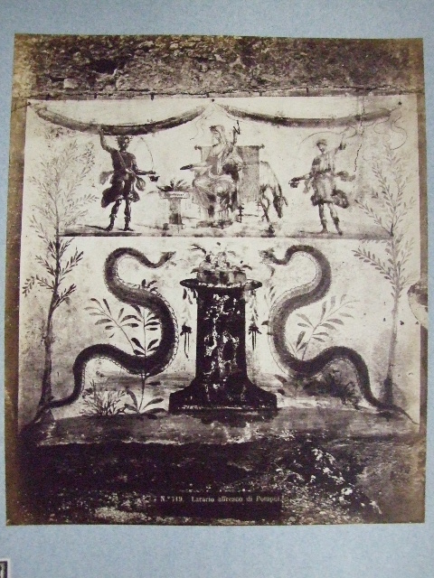 VII.12.11 Lararium on old undated photograph. Courtesy of Society of ...
